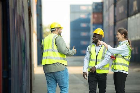 Premium Photo Group Of Workers In A Container Storage Yard Greeting