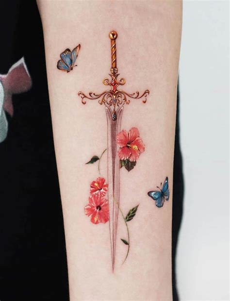 Double Edged Sword Tattoo Meaning Symbolism Culture And Personal