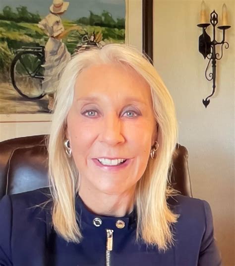 Denise M Dudley