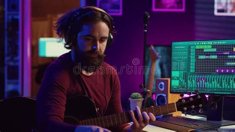 Musical Composer Recording His Guitar Tunes And Adding Piano Key Sounds Stock Video Video Of