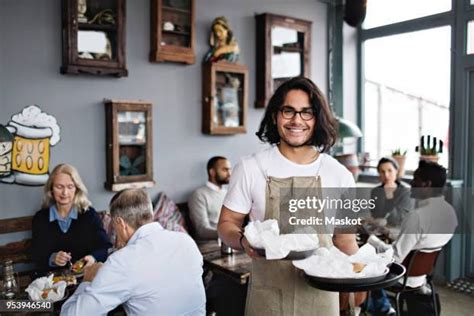 Restaurant Server Bringing Food Photos And Premium High Res Pictures Getty Images