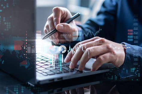 Businessman Using Computer Analyzing Business Graph Chart Data And Investment To Planning And