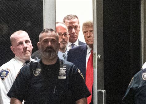 Photos Capture Unprecedented Indictment Of Former President Trump