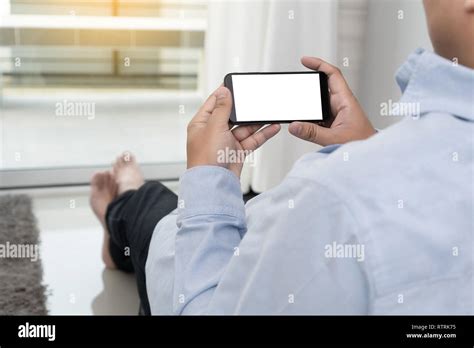 Man Hand Holding The Black Smartphone Screen Mockup Stock Photo Alamy