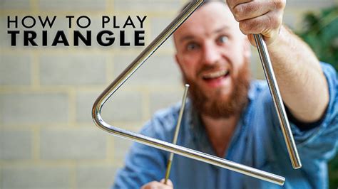 Playing The Triangle Instrument
