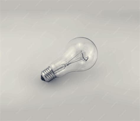 Premium Photo Electric Bulb On A Gray Background