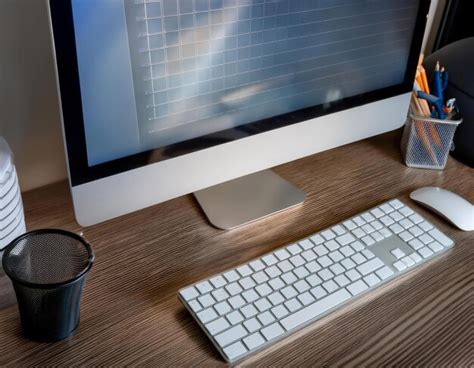 Desktop Computer Setup Including Accessories Like Keyboard And Mouse Representing Office Work