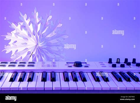 Christmas Background With Midi Keyboard And Holiday Decor With Neon