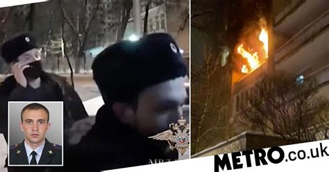Officer Jumps From Balcony Holding Woman To Save Her From Burning Flat