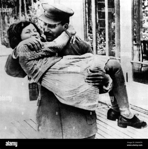File This 1936 File Photo Shows Joseph Stalin Holding His Daughter