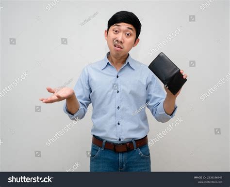 Poor Businessman Holding Empty Wallet Feels Stock Photo 2236196947
