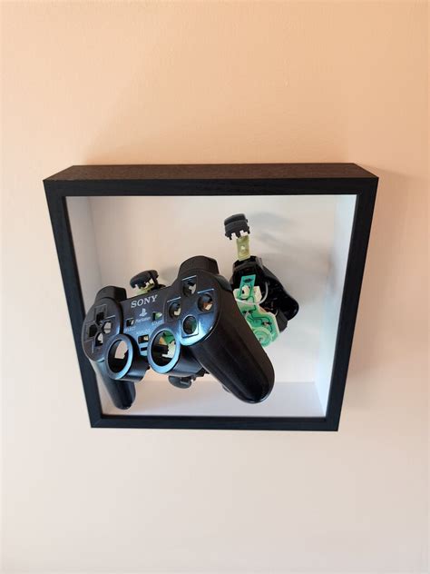 Exploded View Playstation 3 Controller With Frame Disassemble Art