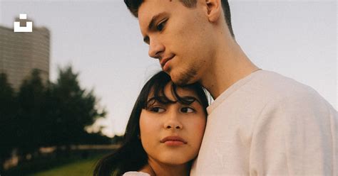 Man Hugging Woman Photo Free Grey Image On Unsplash