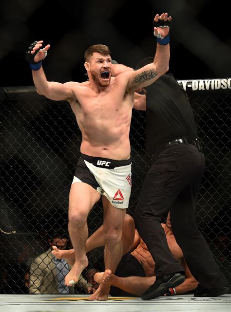 Michael Bisping Stops Luke Rockhold To Claim Title In UFC 199 Stunner