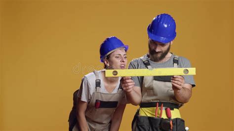 Construction Workers Using Water Level Tools To Measure Flat Surface Stock Footage Video Of