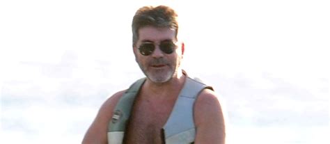 Simon Cowell Rides The Waves While Shirtless In Barbados Shirtless Simon Cowell Just Jared