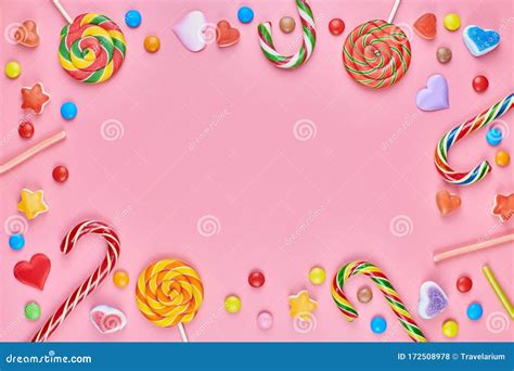 Sweet Candy Copy Space Frame With Lollipops On Pink Background Stock