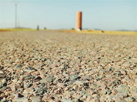Premium Photo Surface Level Of Field Against Clear Sky
