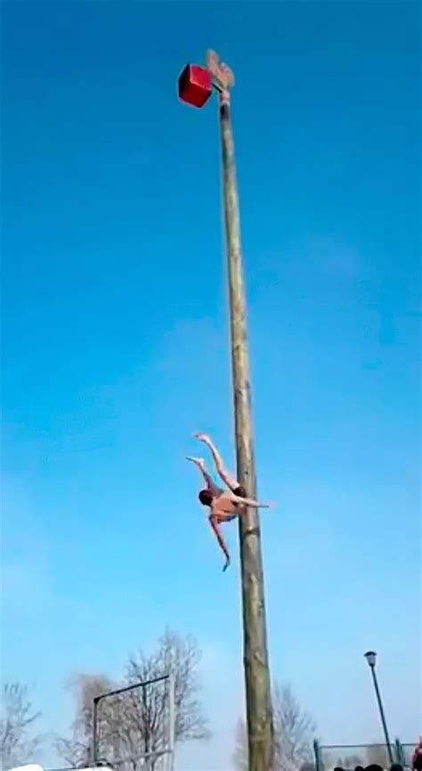 Near Naked Man Falls Feet From Pole As He Takes Part In A Festival WSBuzz