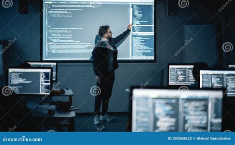 Teacher Giving Computer Science Lecture To Diverse Multiethnic Group Of Female And Male Students
