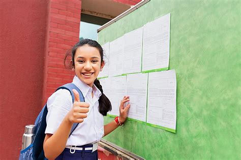 Babe Girl Babe Checking Exam Result In Noticeboard And Showing Thumbs Up Good Result