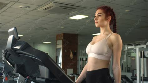 Woman Walking On Treadmill Stock Video Adobe Stock
