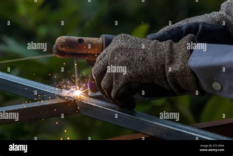 Shielded Metal Arc Welding A Steel Frame With Proper Protection Stock