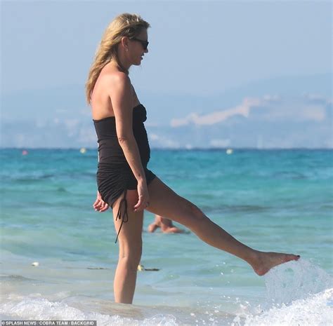 Kate Moss 50 Shows Off Her Supermodel Physique In A Black Swimsuit As