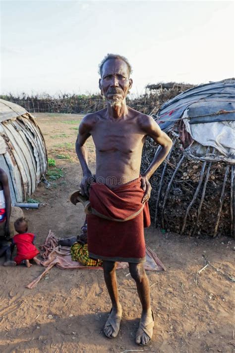 Dassanech Tribe Old Woman With Traditional Bright Necklace In The Local