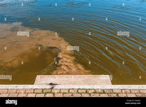 Sewage Pipe Outfall Into The River Water Pollution And Environmental