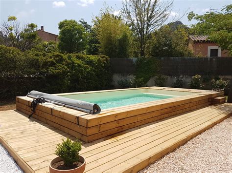 Piscine bois semi enterrée avec terrasse en pin La Piscine Bois