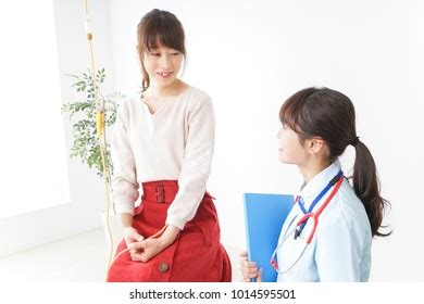 Woman Inserting Intravenous Line Stock Photo Edit Now 1014595480