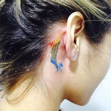 Cute Feather Tattoos Behind Ear