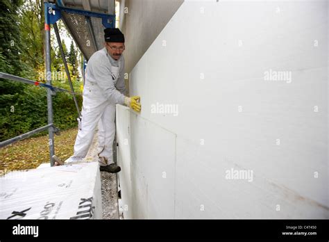 Heat Insulation Of A Building For Saving Energy Styrofoam Panels Are Sticked To The Outside