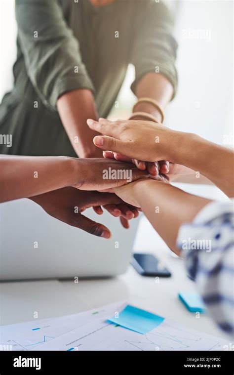 United In Getting The Job Done A Group Of Unrecognizable Businesswomen
