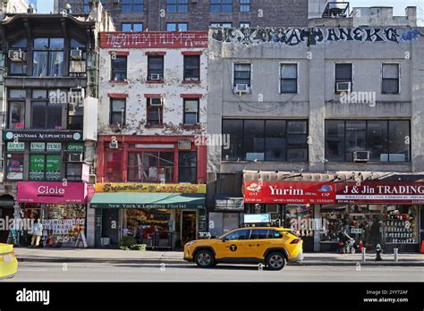 Colorful Business Buildings On 6th Avenue In Midtown Manhattan Stock