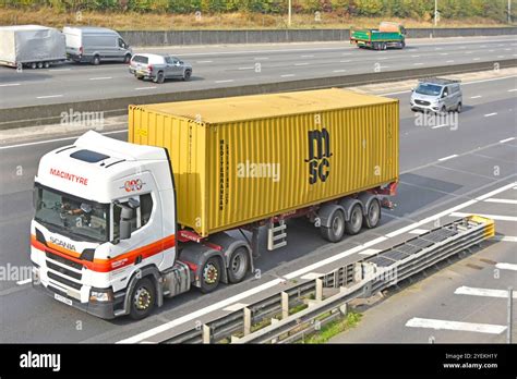 Msc Shipping Container On Articulated Skeletal Trailer Towed By