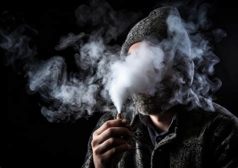 Premium Ai Image A Person Using A Vape To Quit Smoking
