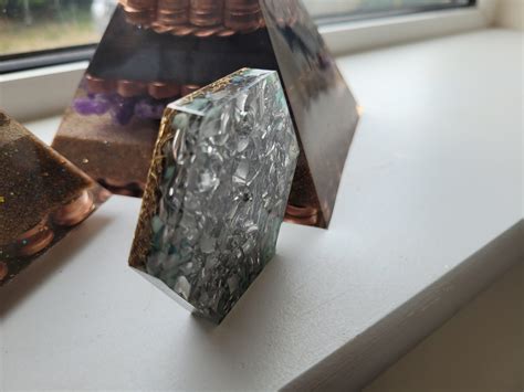 Organite Pendant In A Hexagonal Shape Packed With Metals And Crystals
