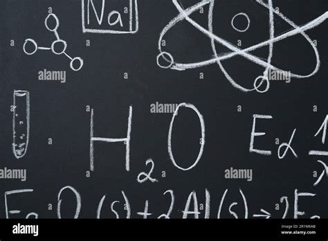 Different Mathematical Formulas Written With Chalk On Blackboard Stock