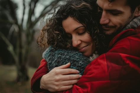 Premium Photo A Man And A Woman Embracing Each Other
