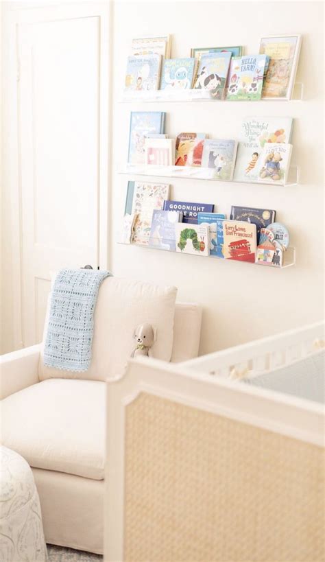 Neutral Nursery With Book Wall
