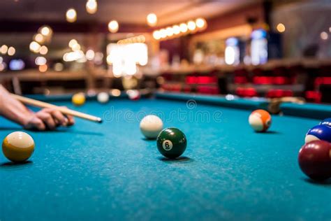 Hand With Cue Aiming On Billiard Ball At Table Stock Image Image Of