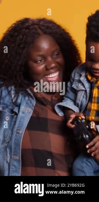 Vertical Video Loving Mother Acting Silly And Dancing With Her Infant Son Happy Mommy Bonding