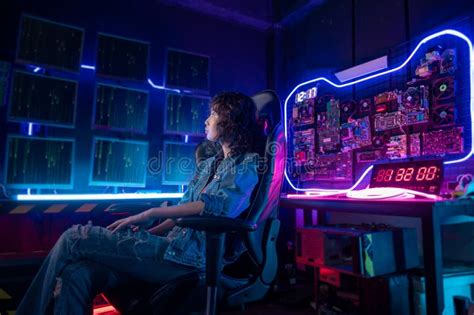 Asian Woman Programmer Is Working In Her Computer Room Futuristic