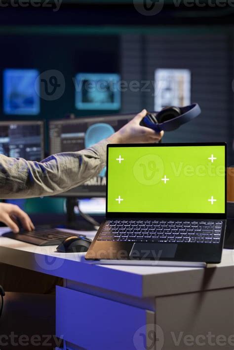 Focus On Green Screen Laptop Used By Developer Updating Artificial