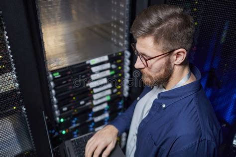 technician working in data center with server racks stock image image of tech gadget 375192165