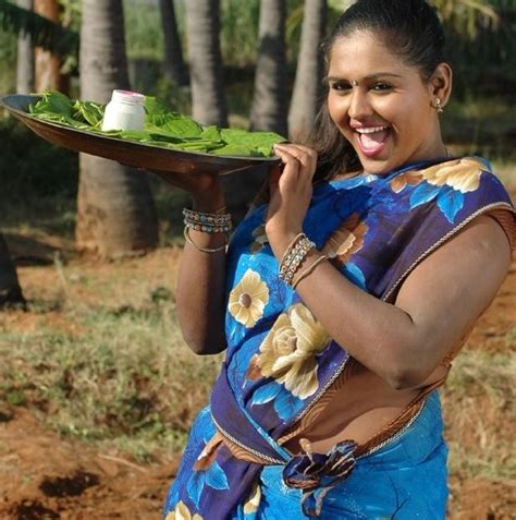 sexclusive stills nagalakshmi exposing in blue colour saree