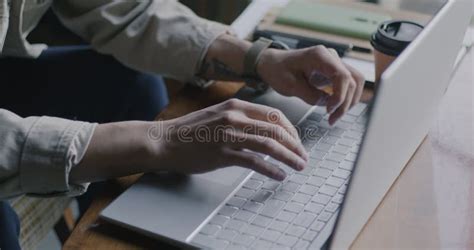 Close Up Of Asian It Guy Working With Laptop Computer Programming