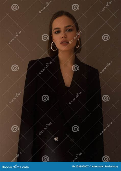 Fashion Photography A Beautiful Girl In A Black Jacket With A Dramatic
